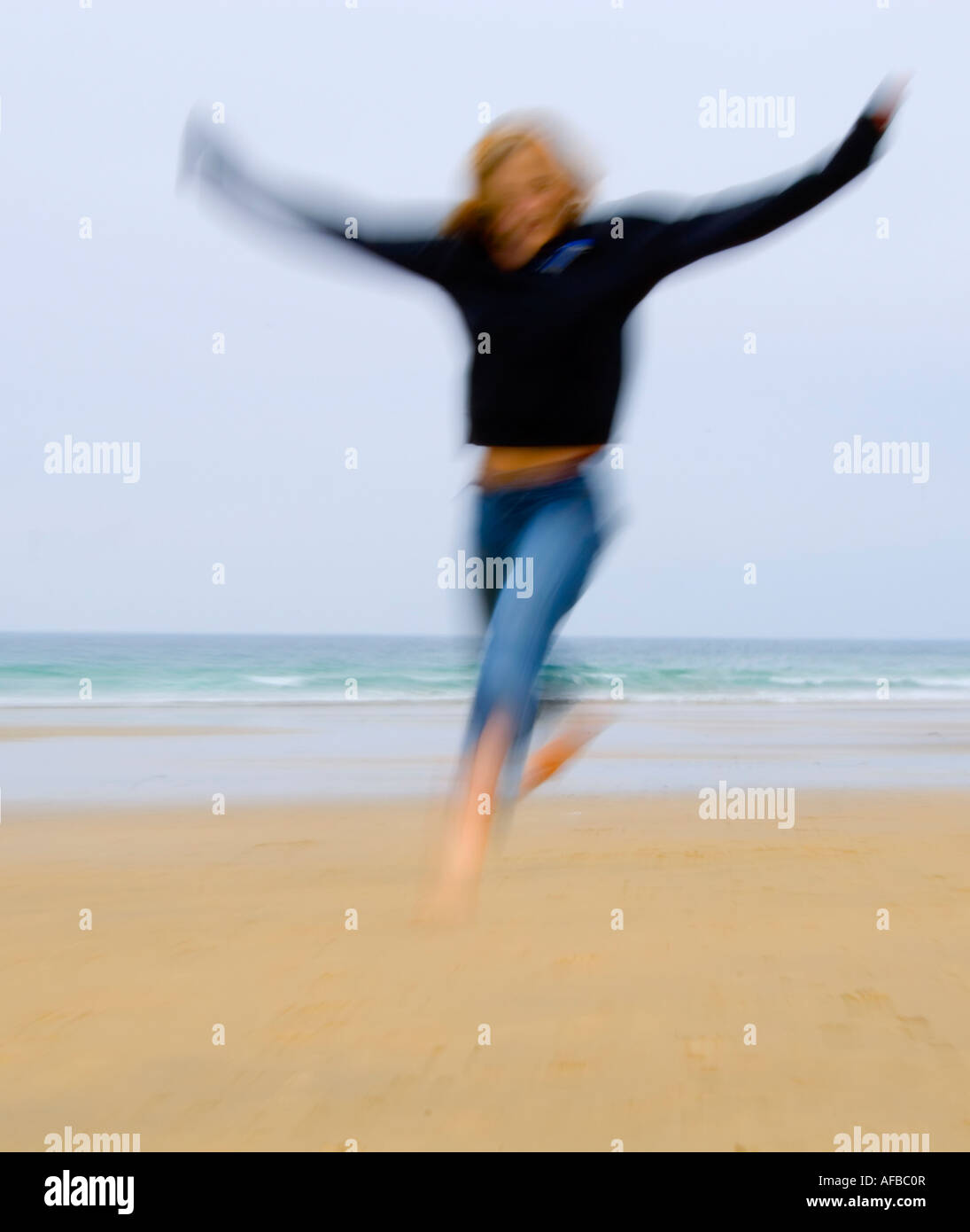 Jumping in slow motion hi-res stock photography and images - Alamy