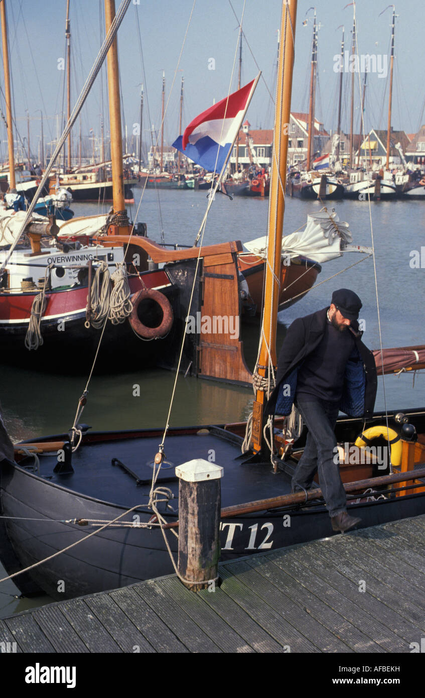 Netherlands Volendam Fisherman in traditional dress at harbour Stock ...