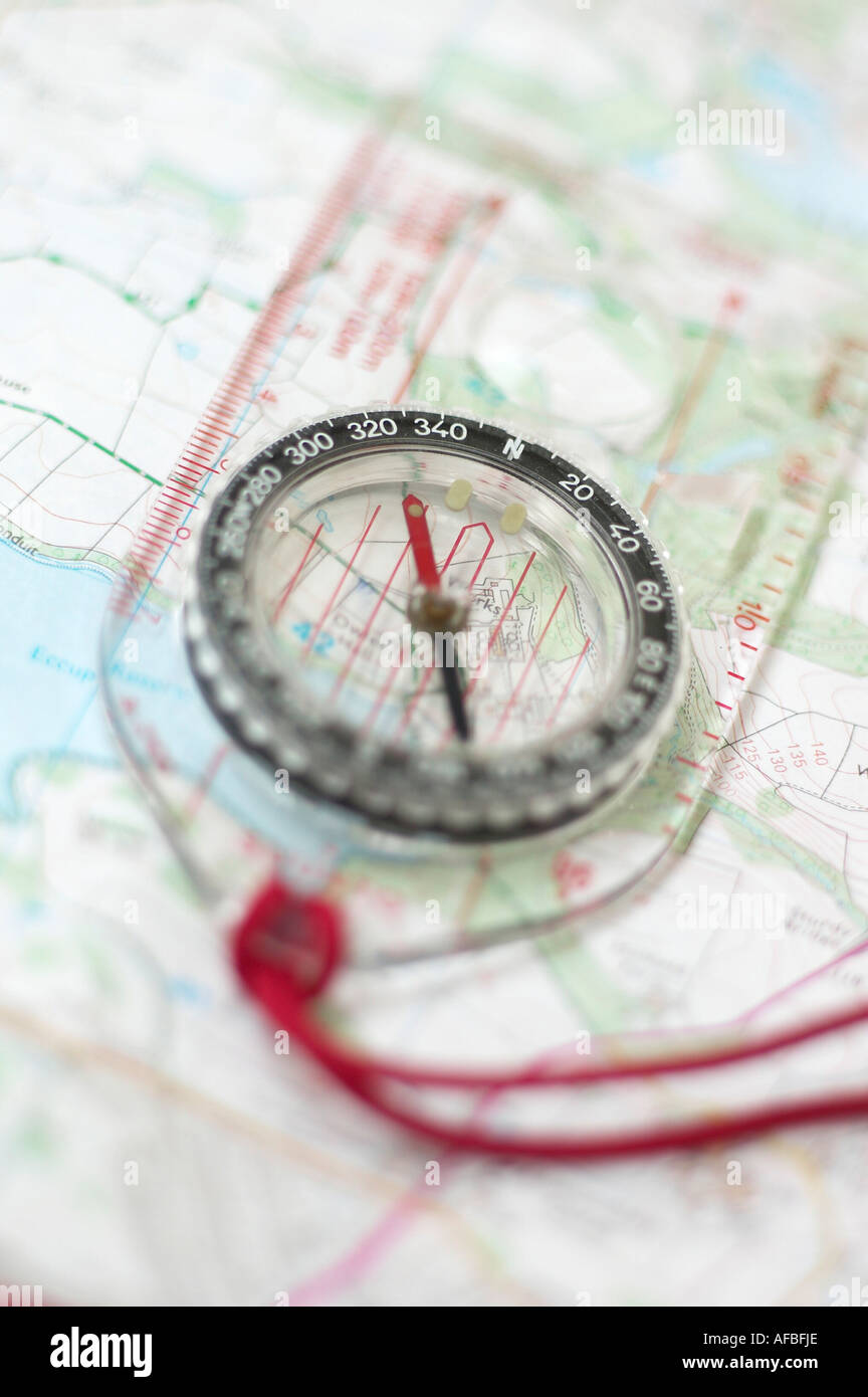 Compass on Map Stock Photo - Alamy