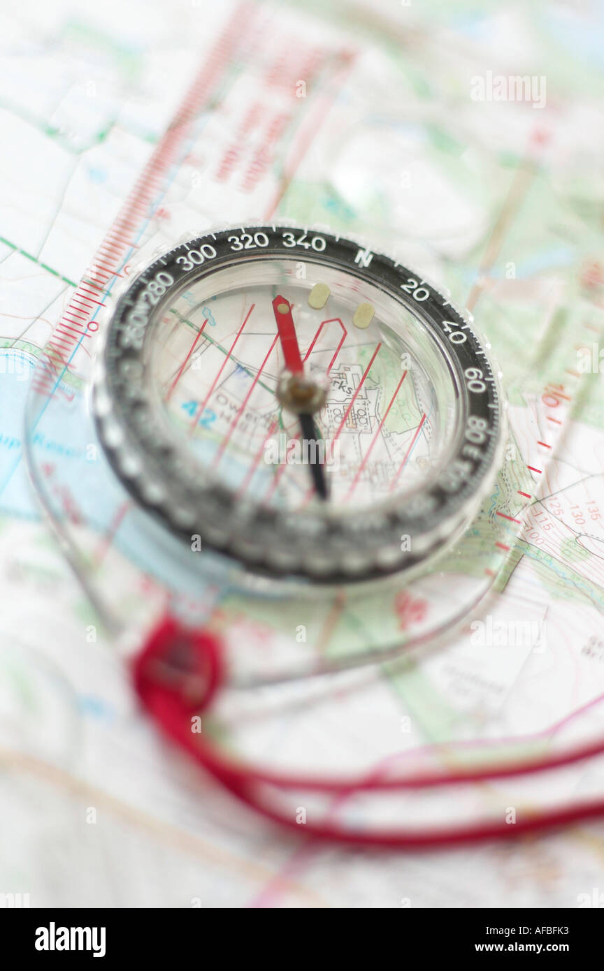 Compass on Map Stock Photo - Alamy