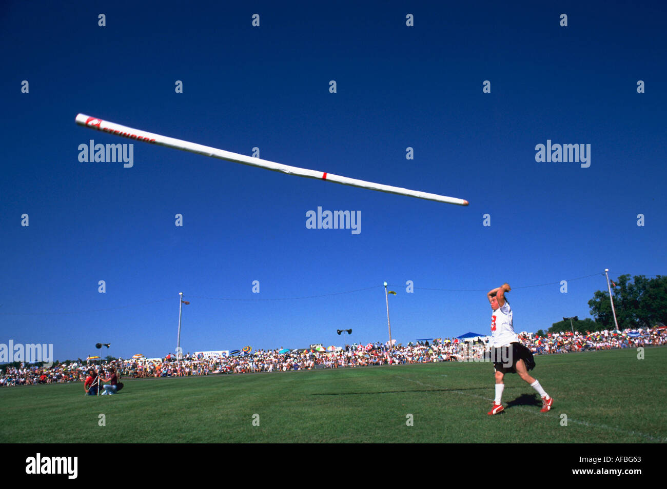 Male competitor throwing in the caber toss competition at the Glengarry ...