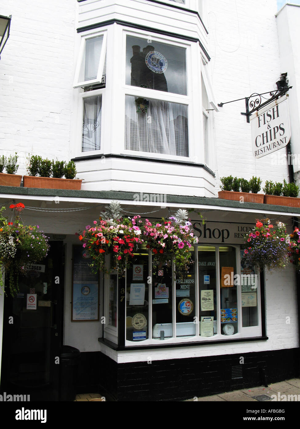 Traditional english fish and chip takeaway shop hi-res stock ...