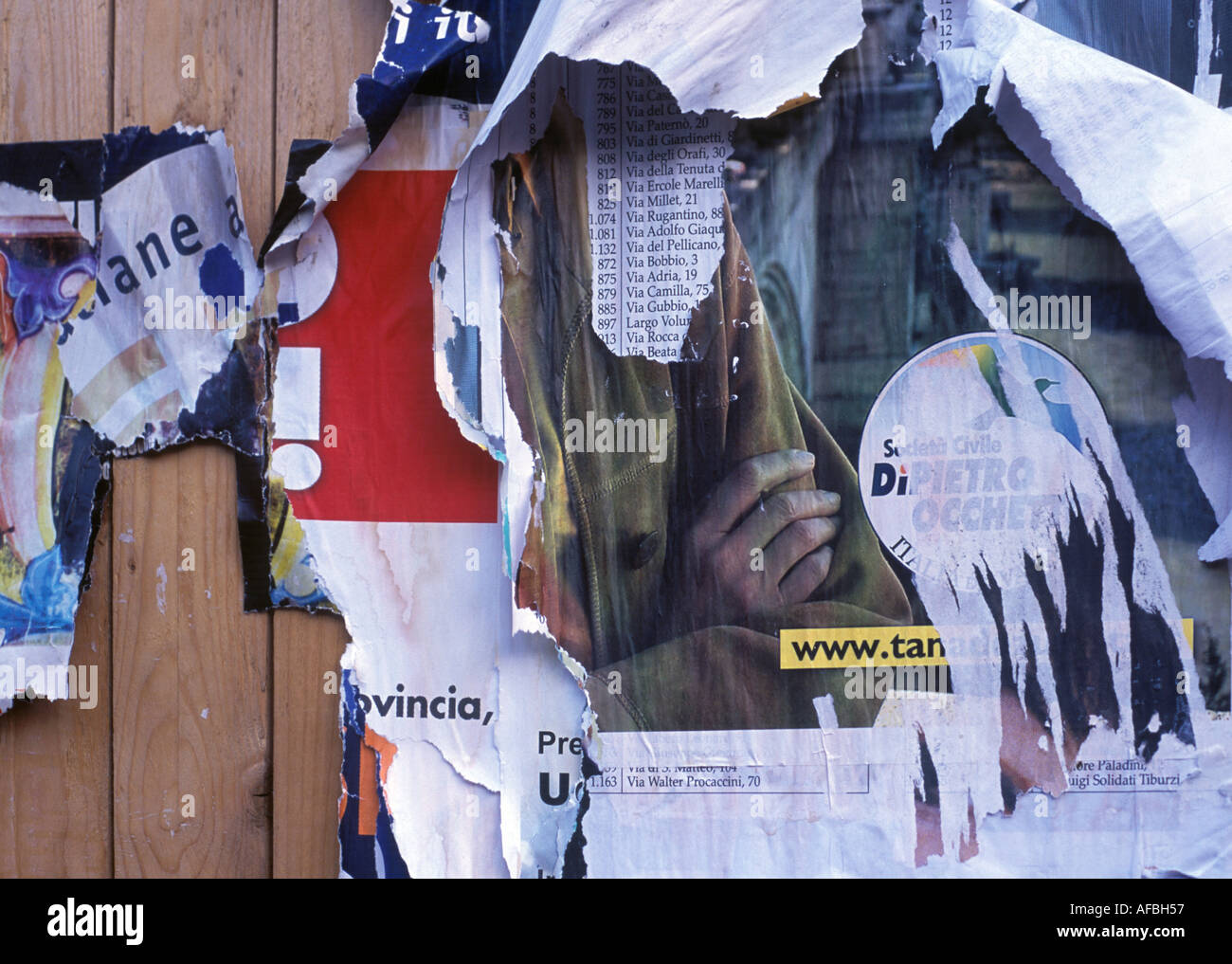 Torn posters in Rome Italy Stock Photo - Alamy