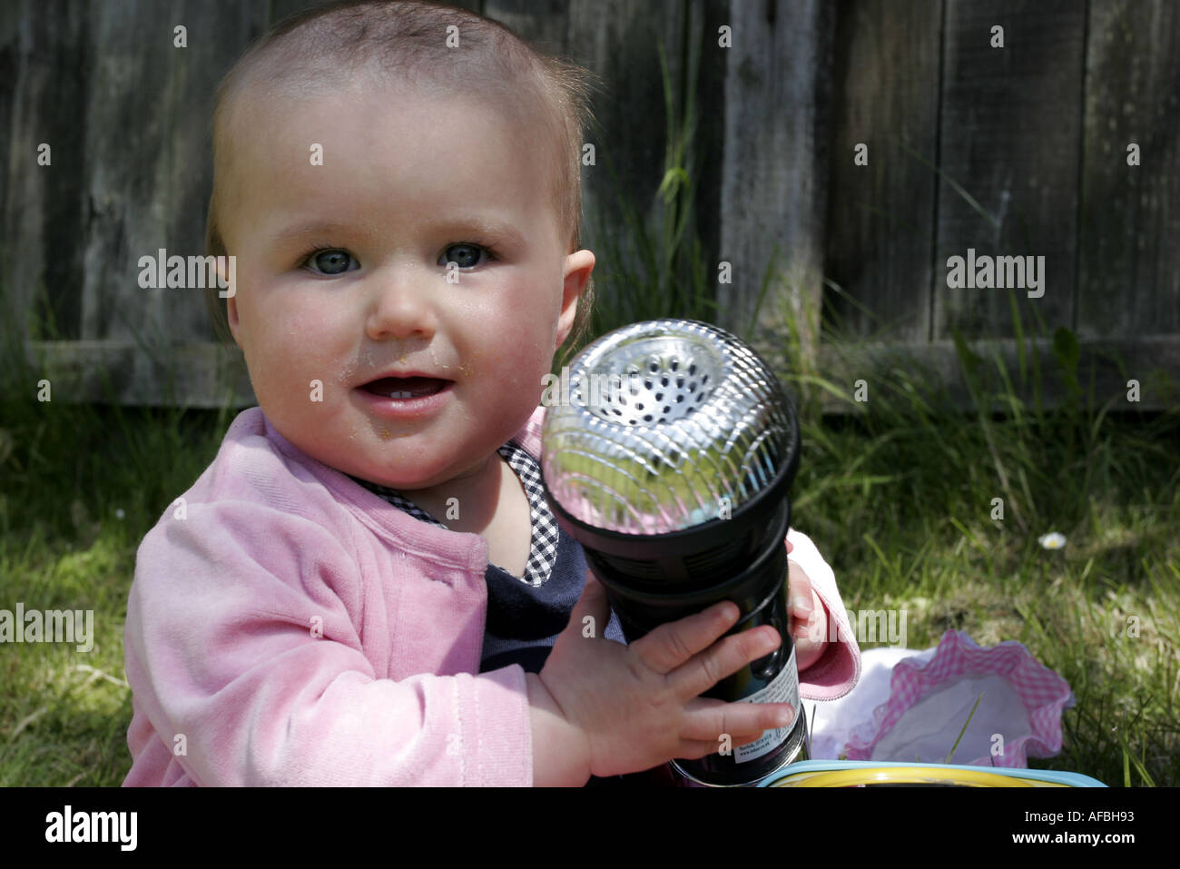 Child singing outside microphone hi-res stock photography and images ...