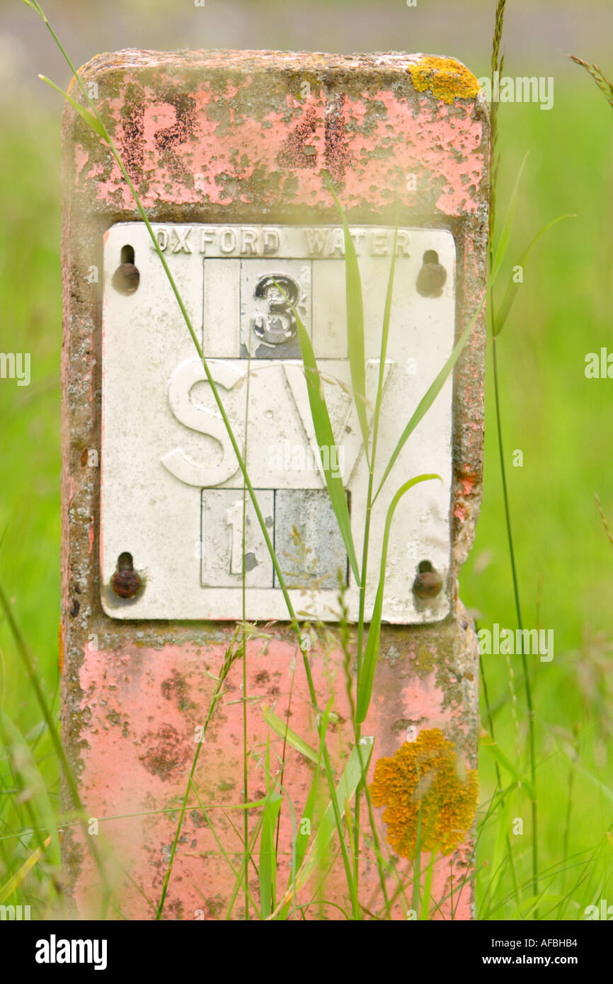 Water board pipe markers painted pink Stock Photo - Alamy