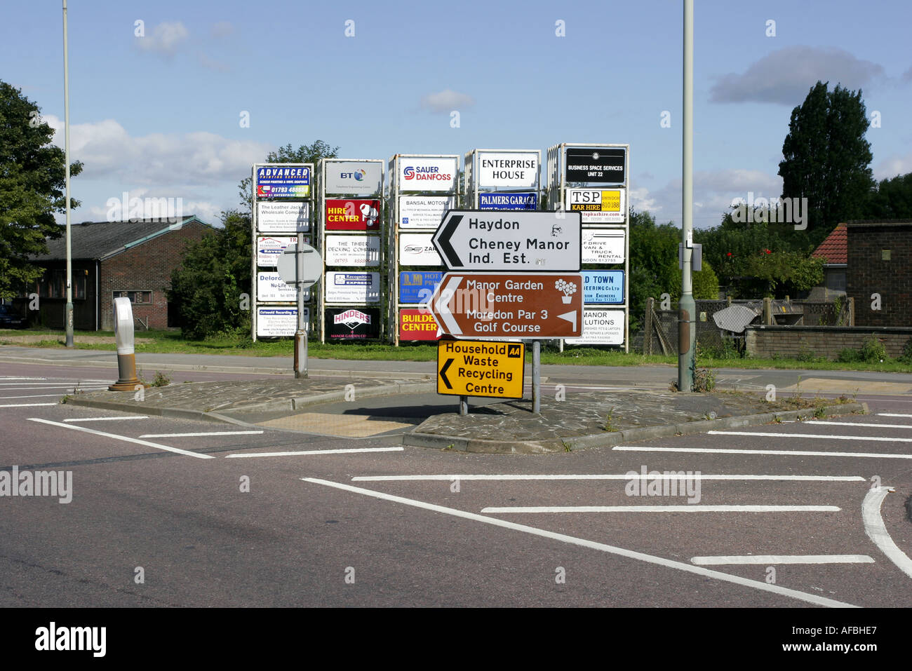 Clutter of signs outside an industrial estate in Swindon Stock Photo ...