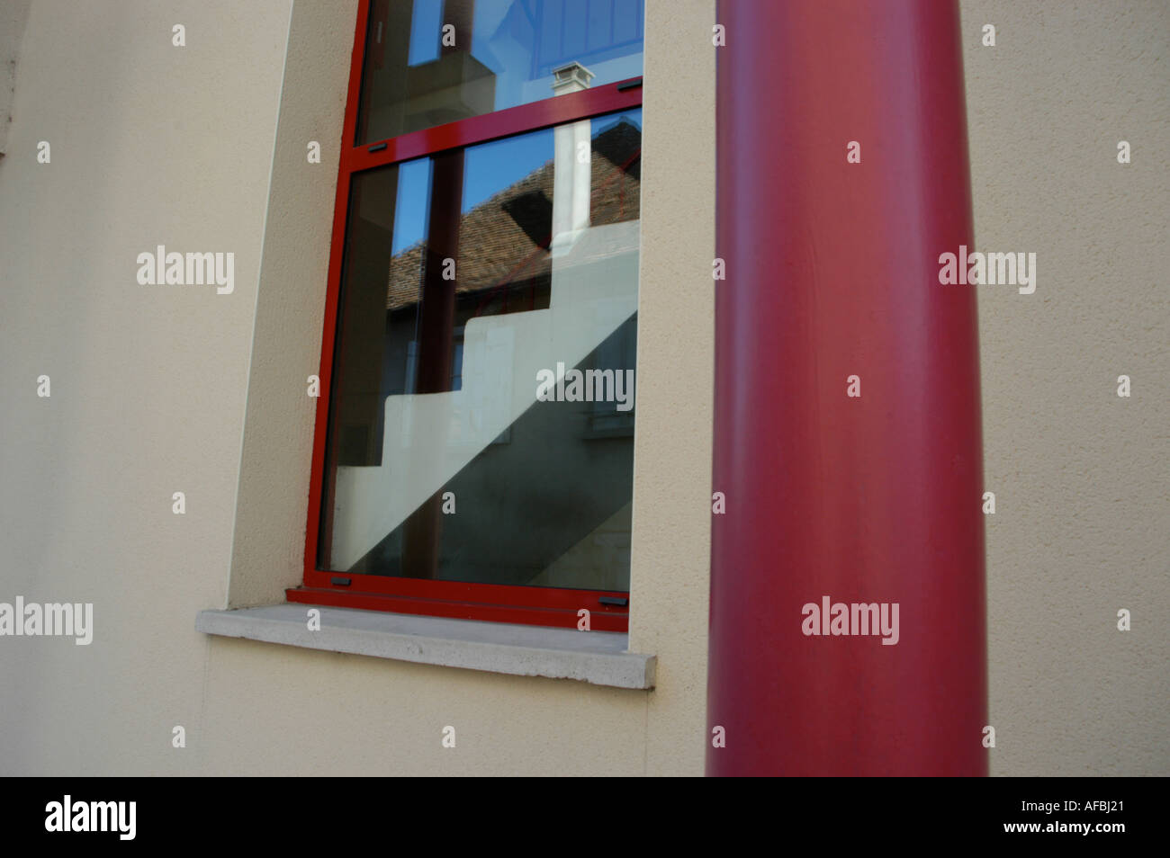 window and red pillar and stairs reflection Stock Photo - Alamy