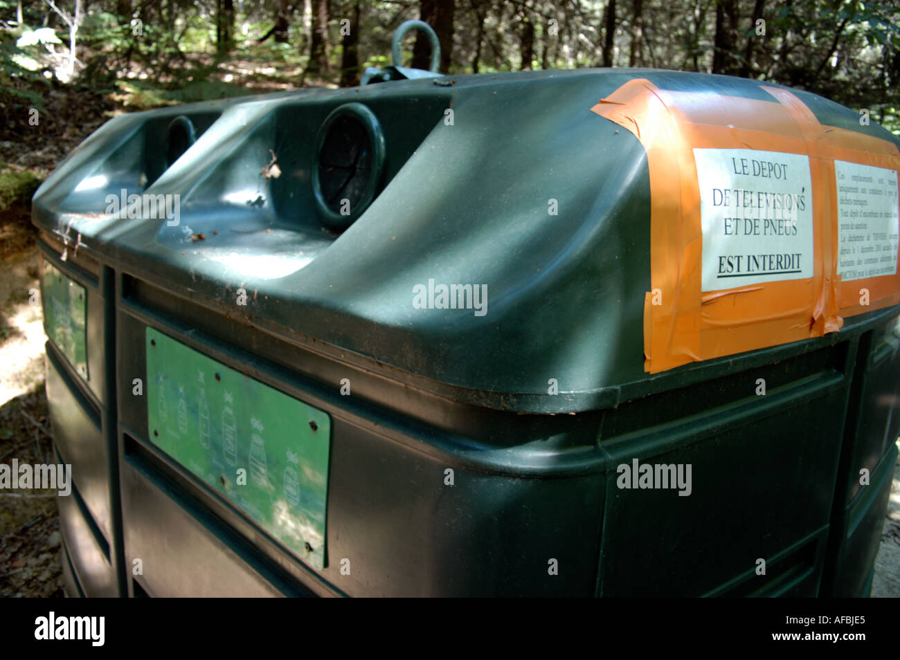 plastic recycling rubbish bin in woods in dordogne france Stock Photo ...