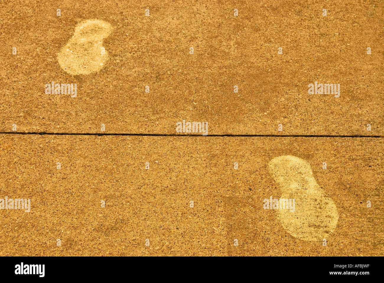Footprints in Cement 2 Stock Photo - Alamy