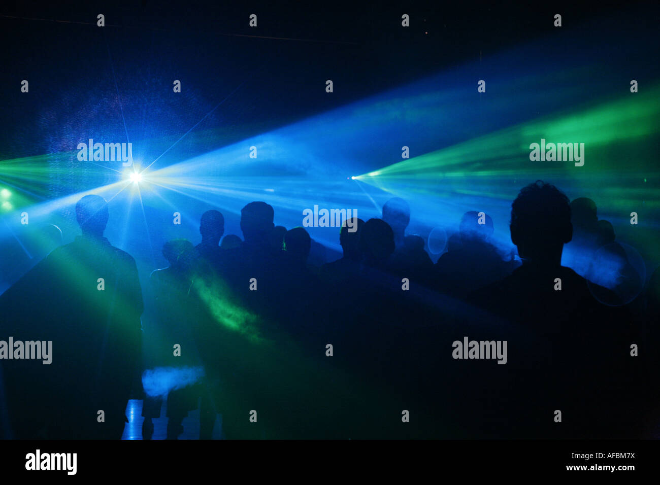 People on the laser light show Stock Photo - Alamy