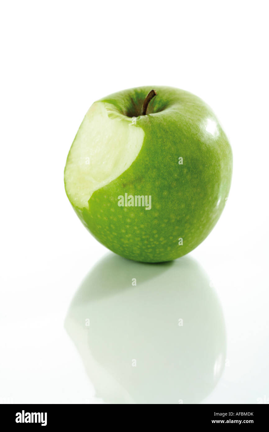 Fresh green apple, bitten inside Stock Photo - Alamy