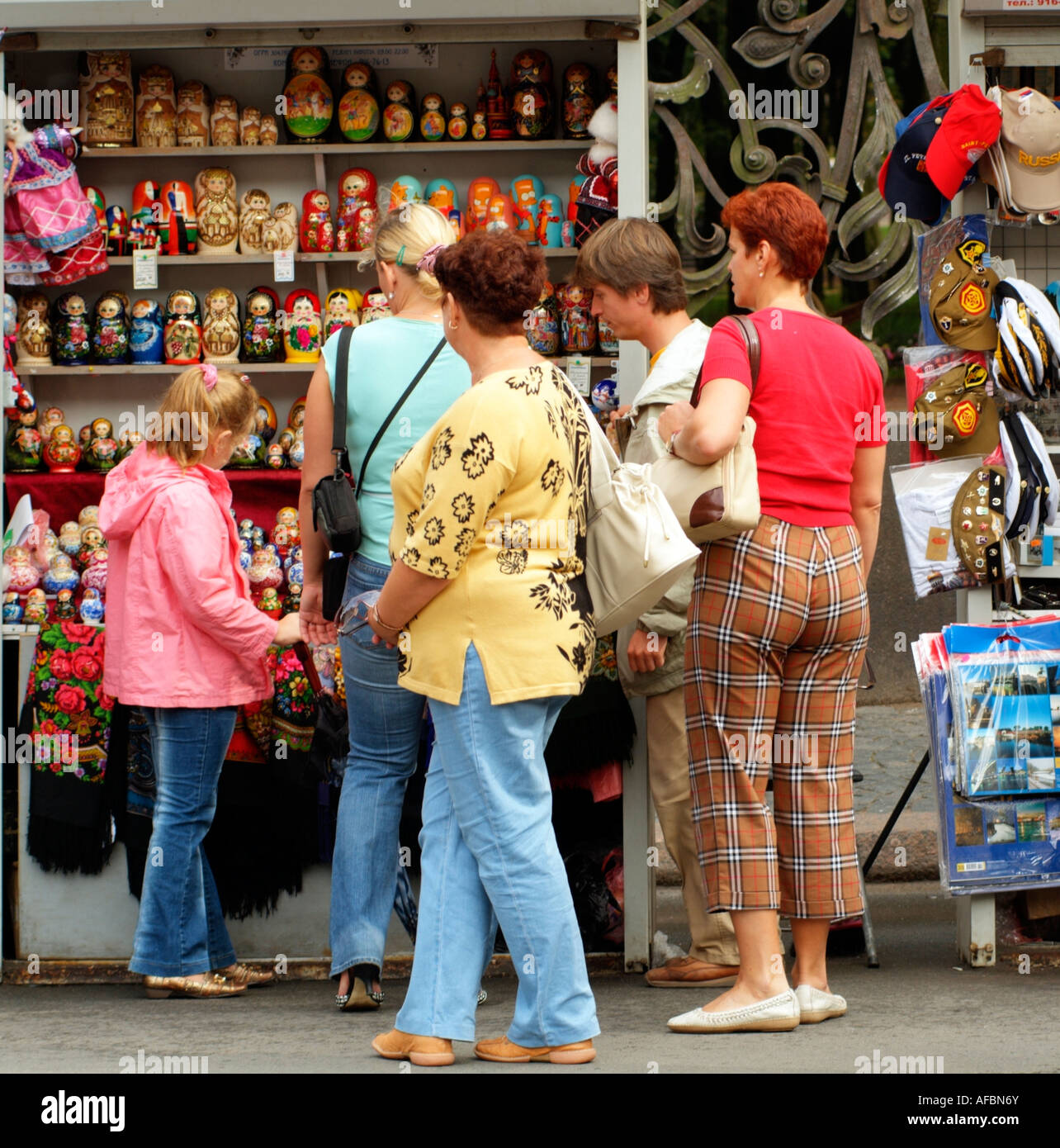 Souvenir shopping St Petersburg Russia Tourists purchase souvenirs and ...