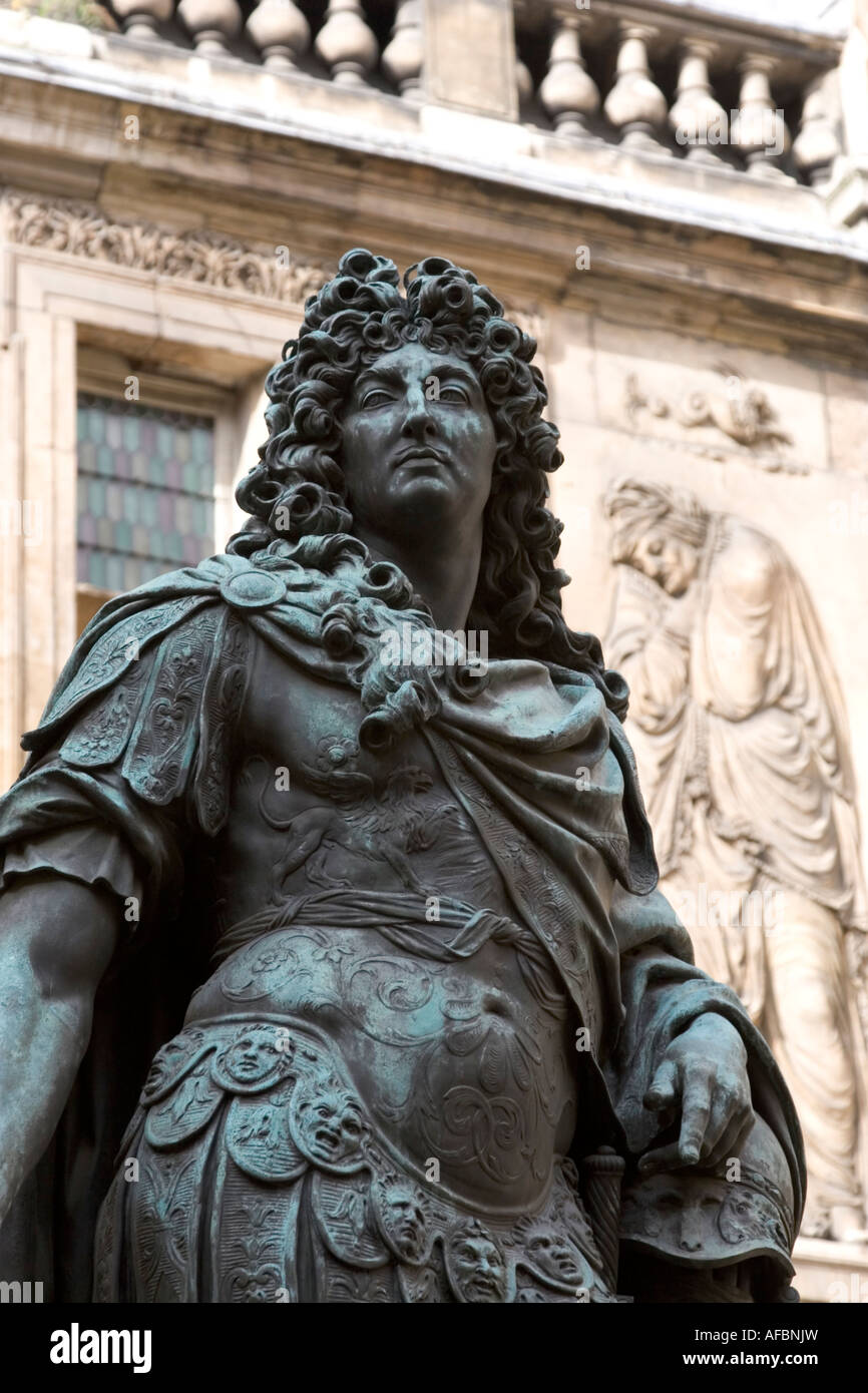 Paris France Statue of Louis XIV in the courtyard of the Musee ...
