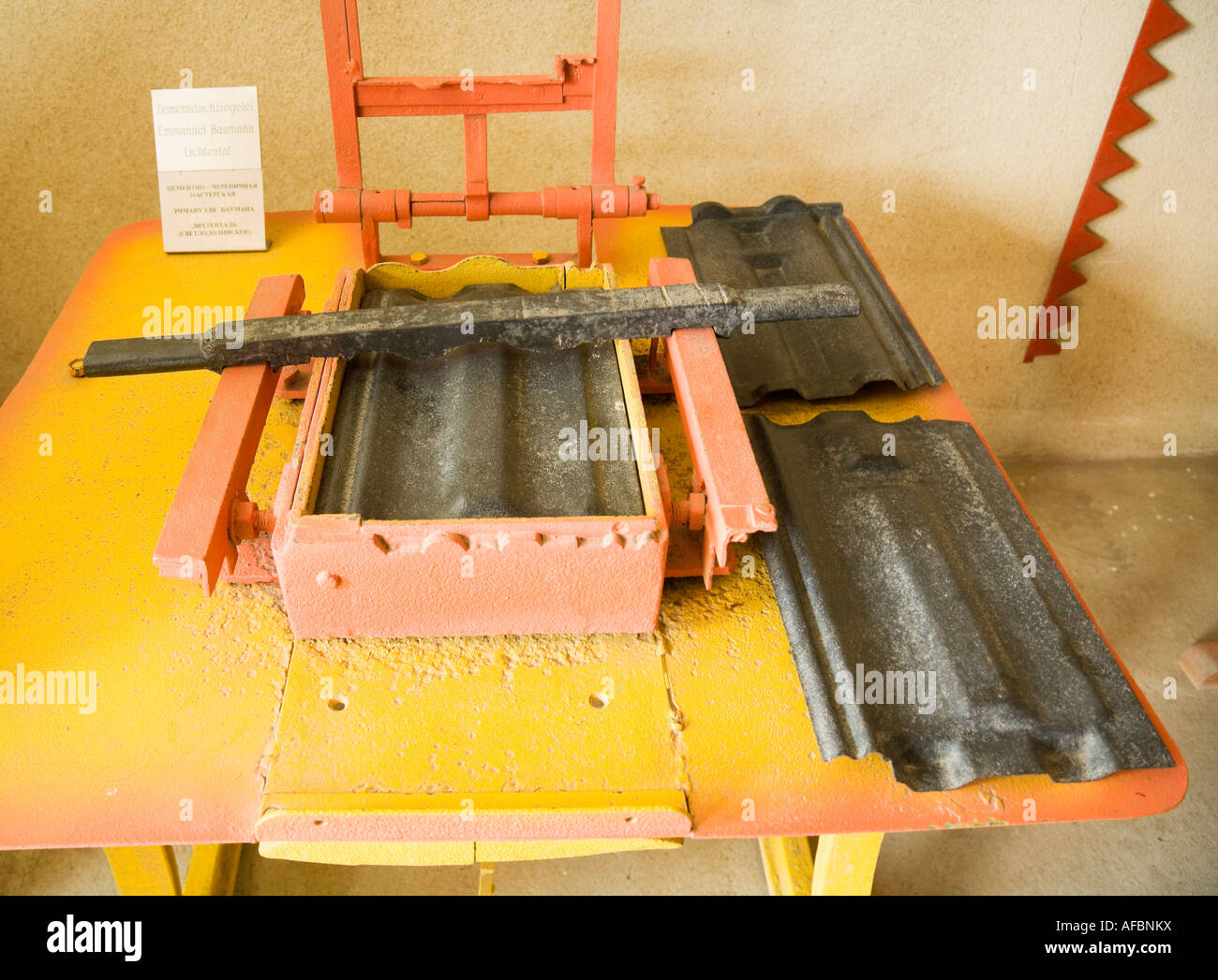 A device for producing cement roof tiles at the farmers museum in the ...