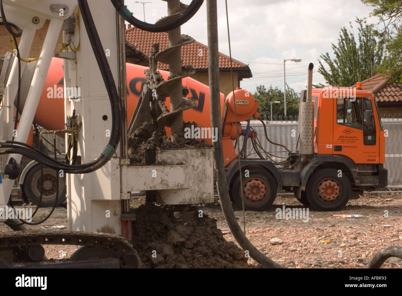 Piling machine on building site Stock Photo - Alamy