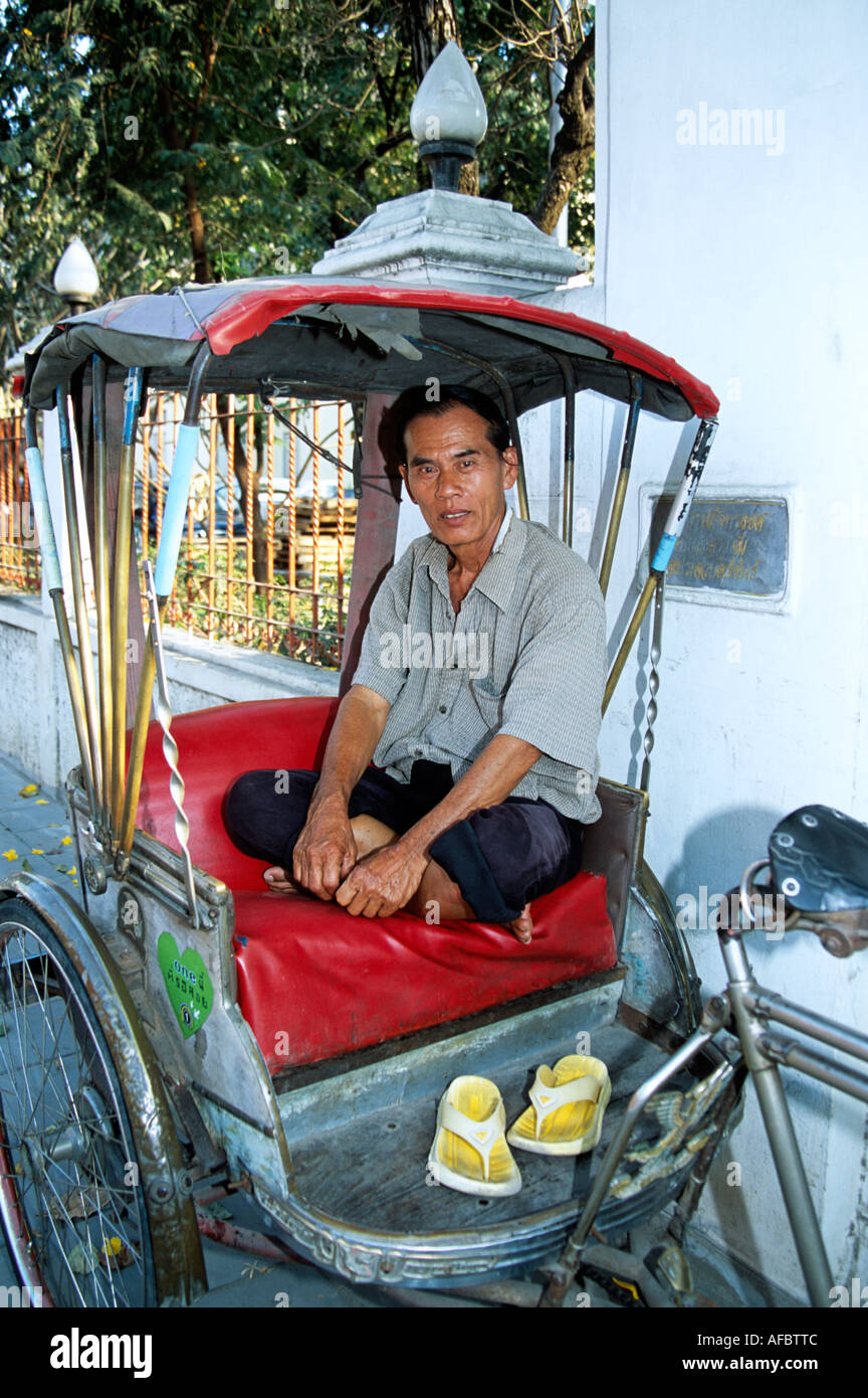 Bicycle rickshaw driver sitting in rickshaw, Chiang Mai, Thailand Stock ...