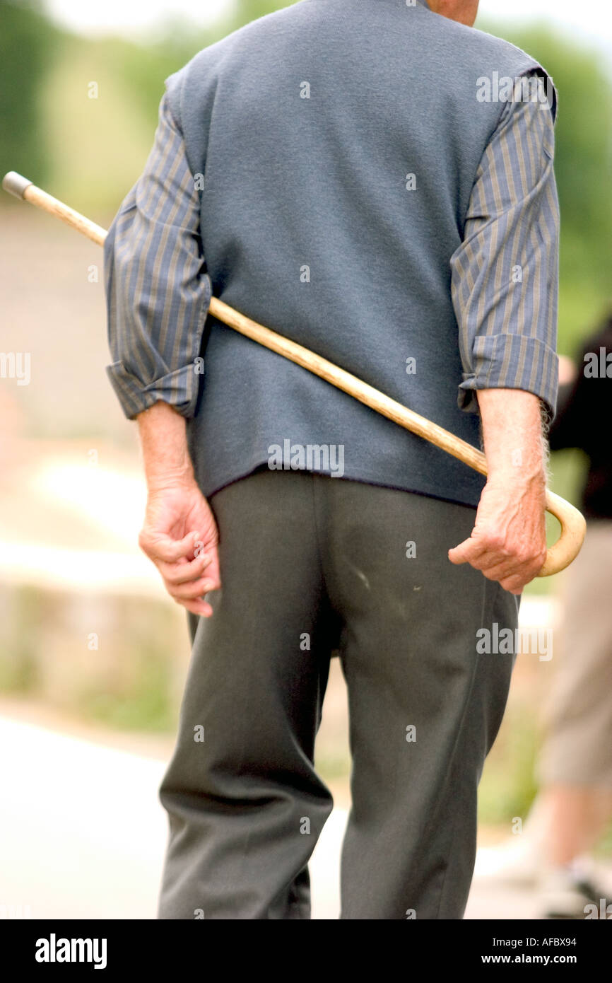 details of back of man with a can stick Stock Photo - Alamy