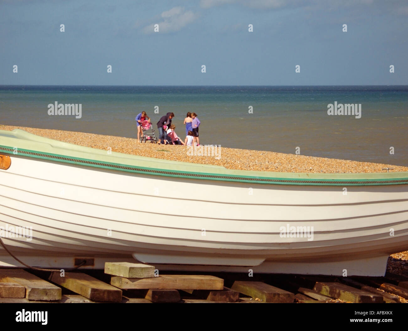 Family on the Seafront Beach Fishing Boat Scene Deal Kent England ...
