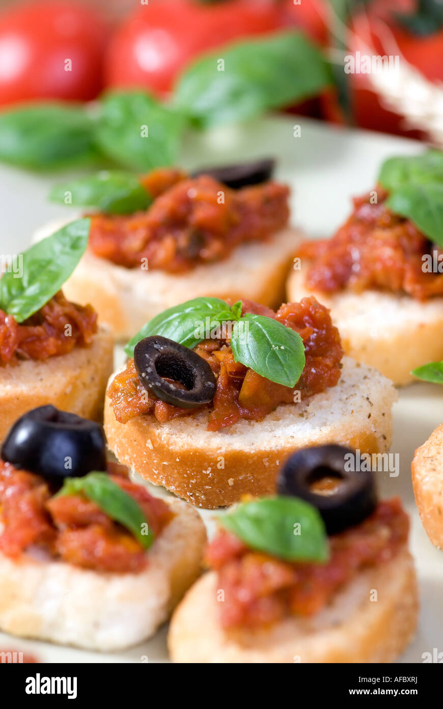 The perfect Italian appetizer fresh bruschetta with basil and olives ...