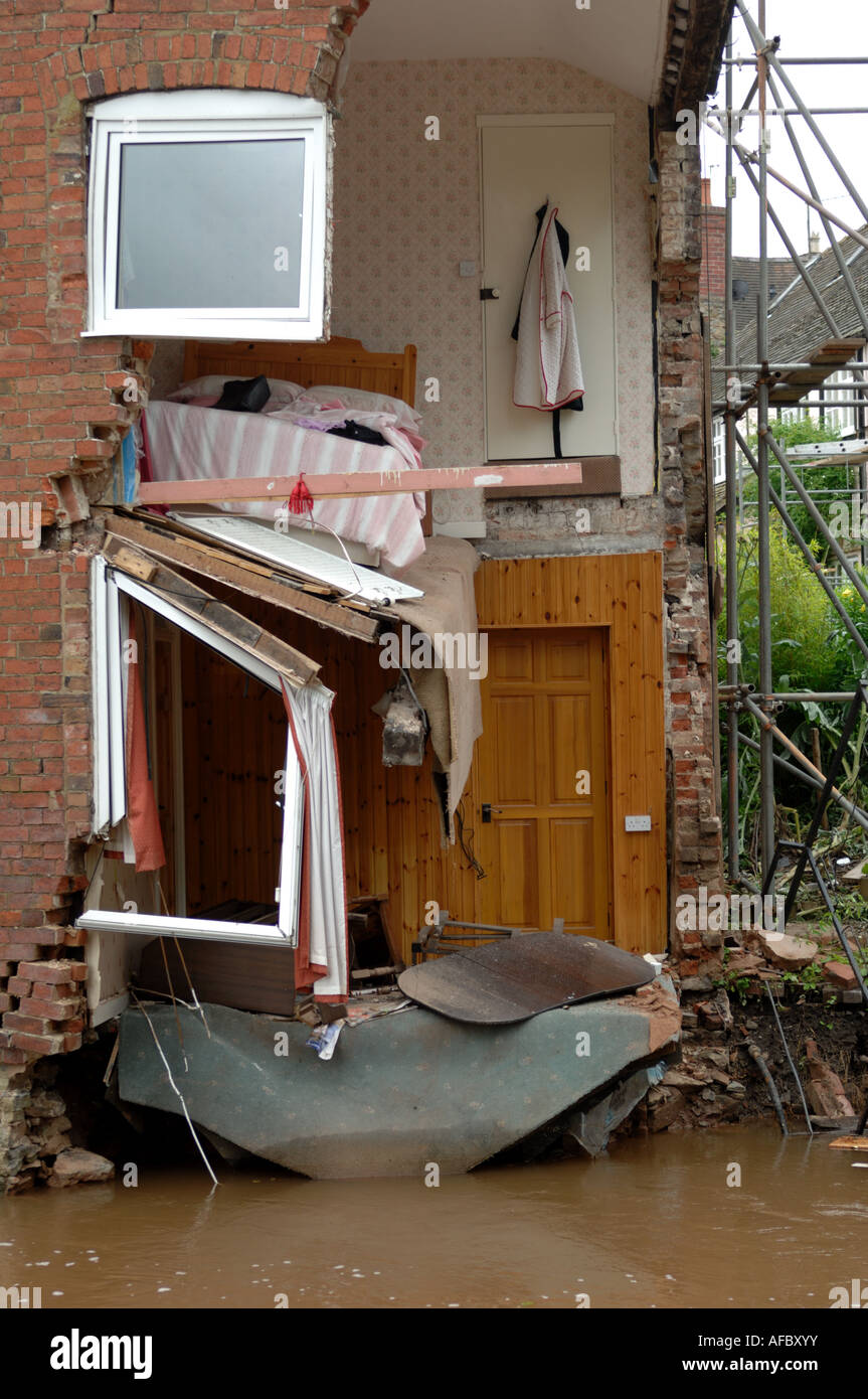 House collapsed into river after flooding of the river Corve inUpton ...