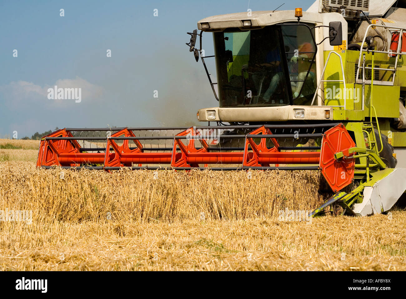 Germany, Bavaria, Combine harvester harvesting wheat Stock Photo - Alamy