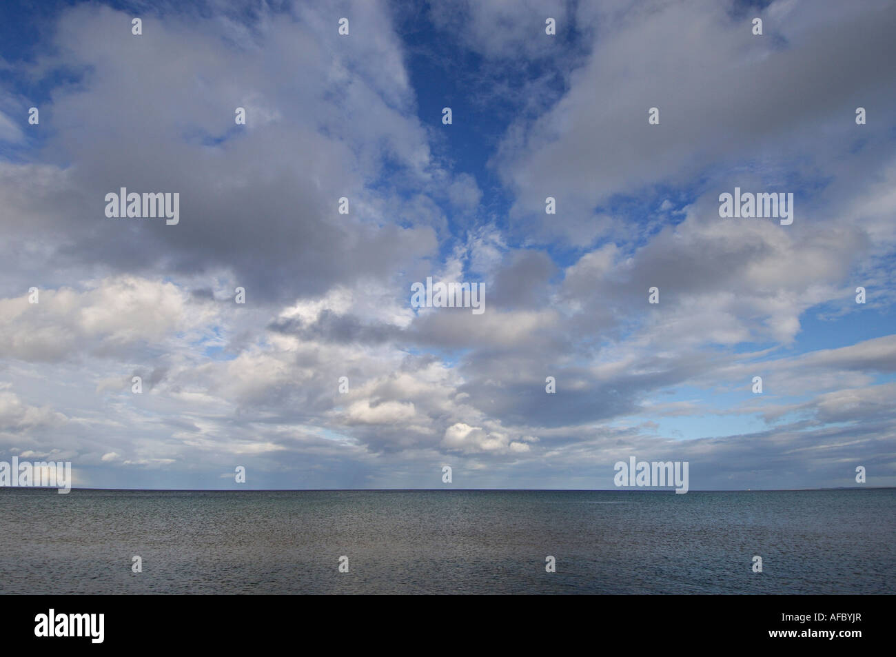 Dramatic autumnal sky with varied clouds above a low horizon in the ...
