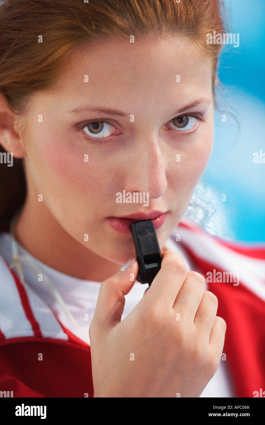 Young woman with whistle Stock Photo - Alamy