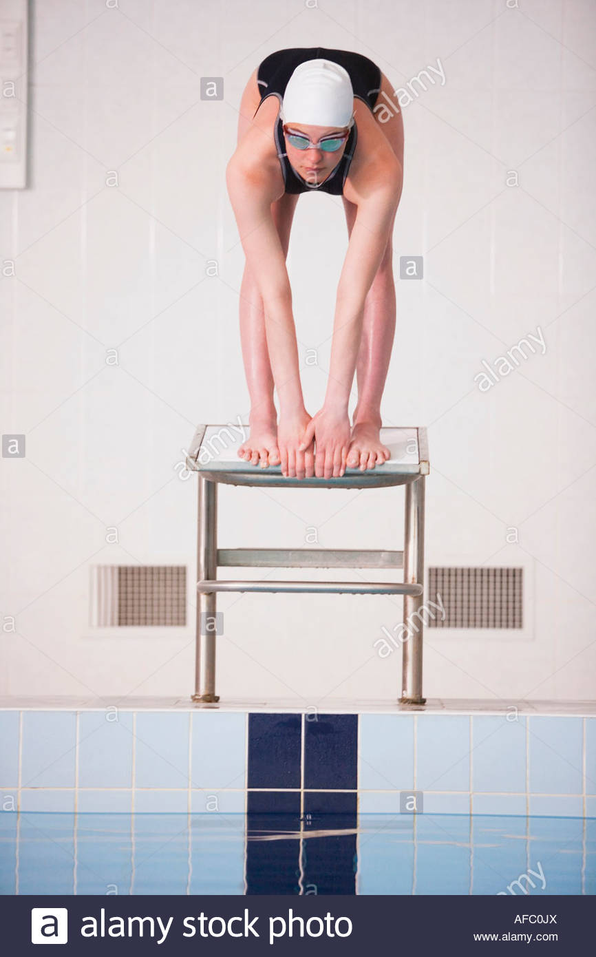 Young Female Athlete On Starting Blocks Stock Photos & Young Female ...