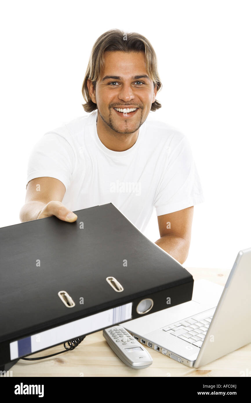 Man presenting folder, close-up Stock Photo - Alamy