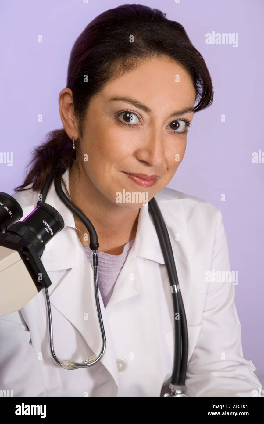 Portrait of a medical researcher with microscope Stock Photo - Alamy