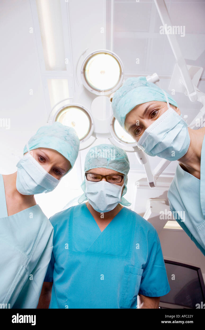 Surgery team in the operating room Stock Photo - Alamy