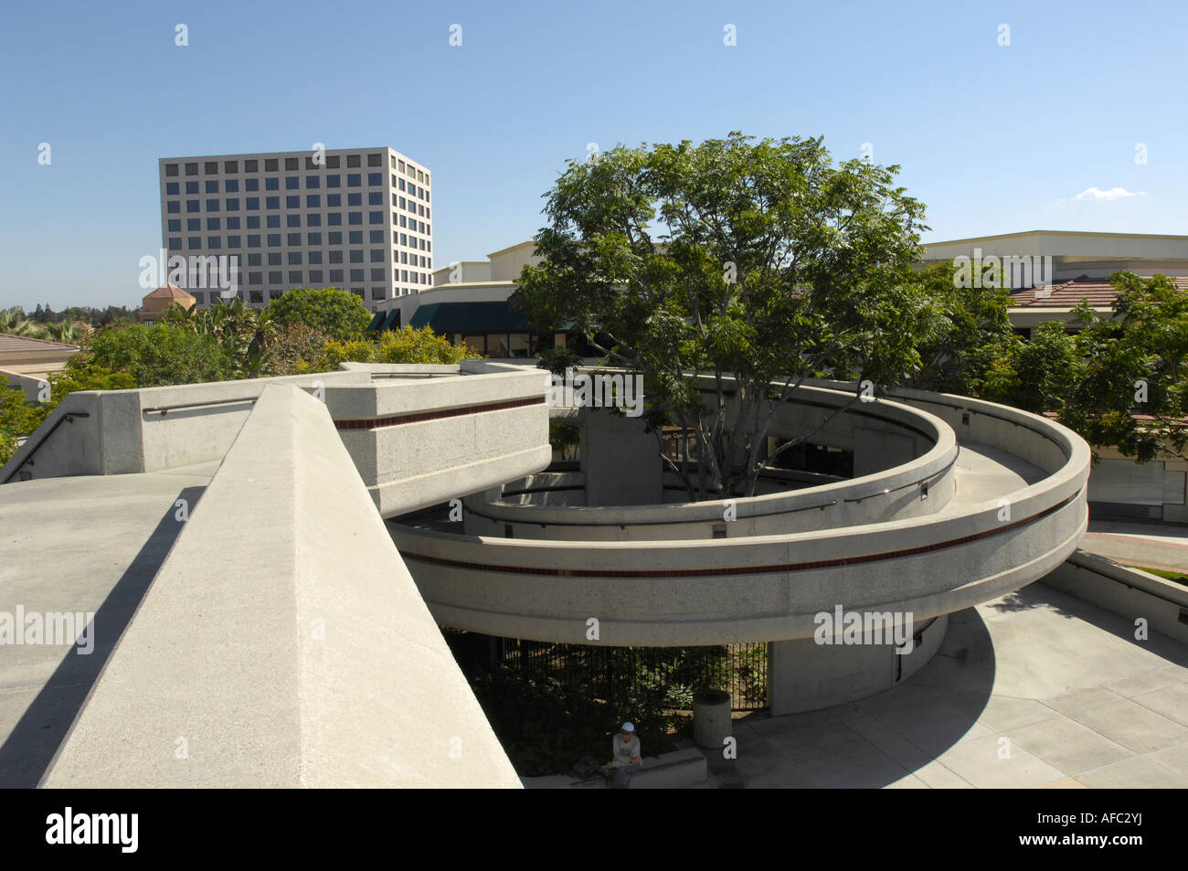 Interesting bridge architecture on a footpath between a shopping center ...