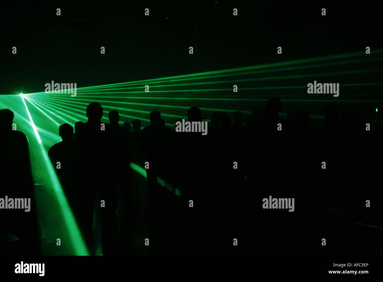 People on the laser light show Stock Photo - Alamy