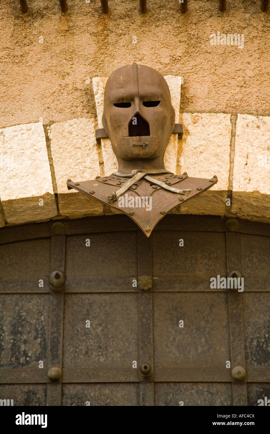 Iron Mask on old doorway City of Cannes France Stock Photo - Alamy