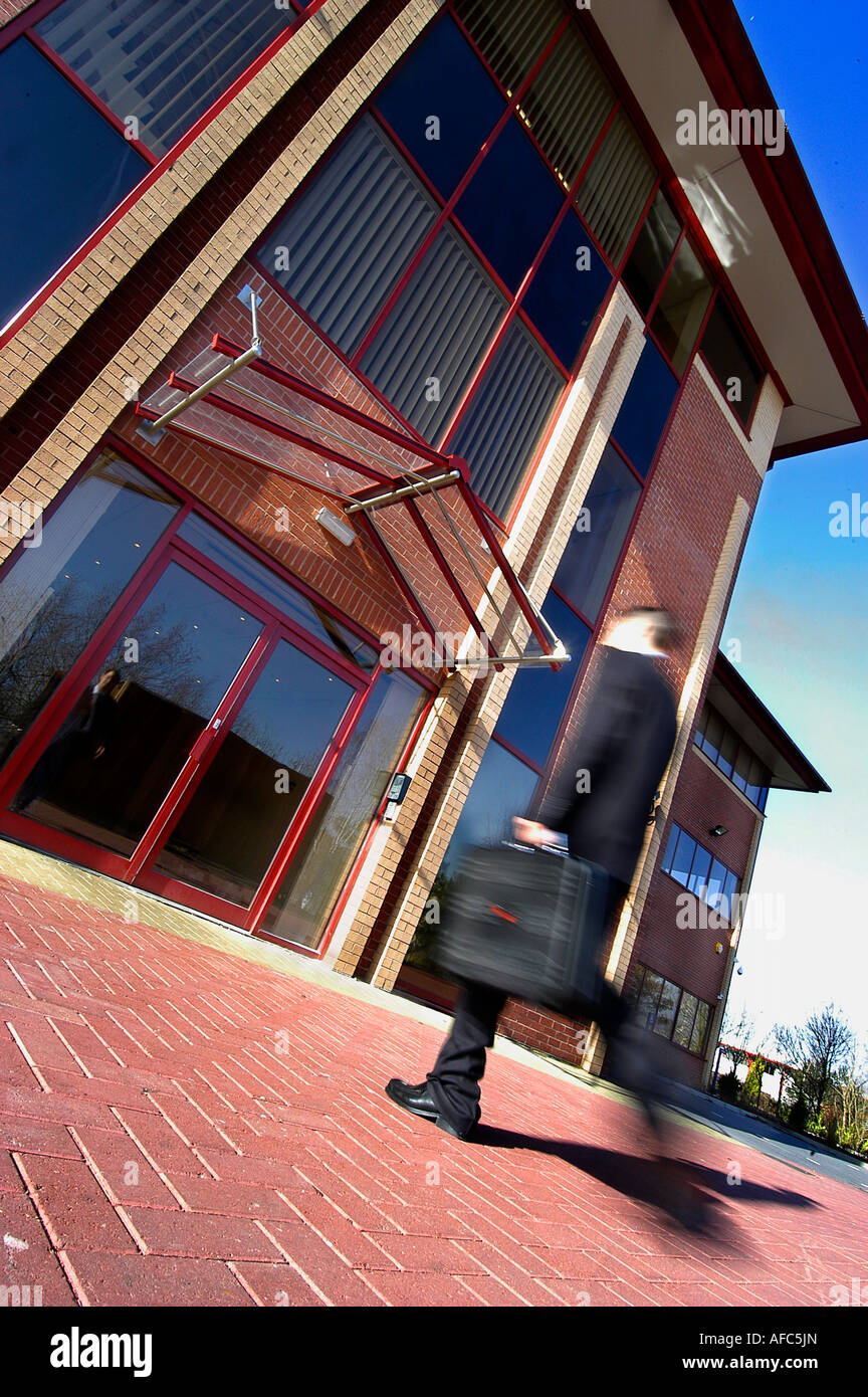 person entering office building Stock Photo - Alamy