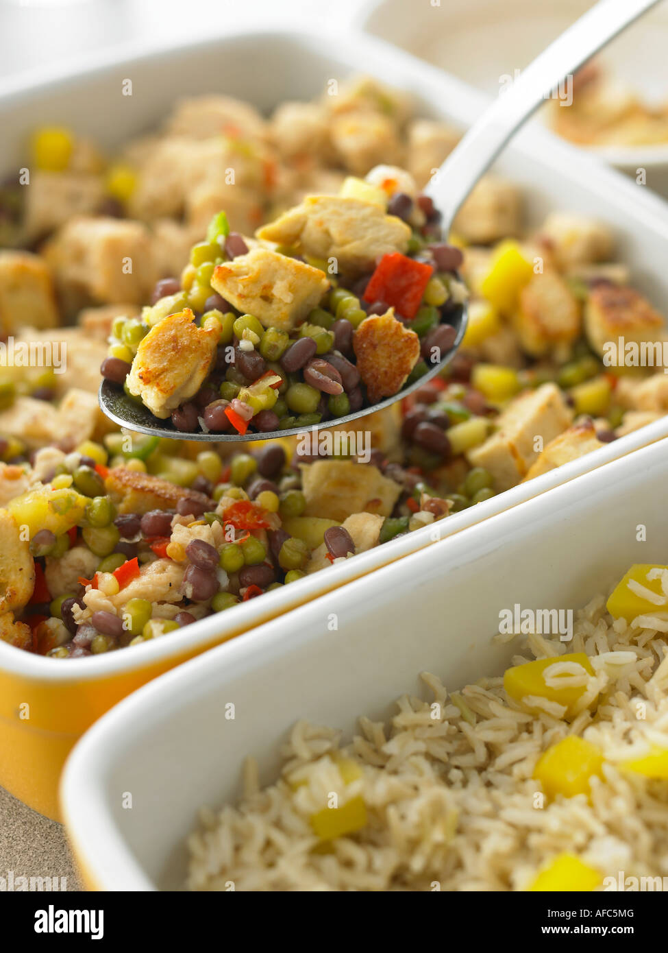 Quorn and bean chilli with mango rice Stock Photo - Alamy