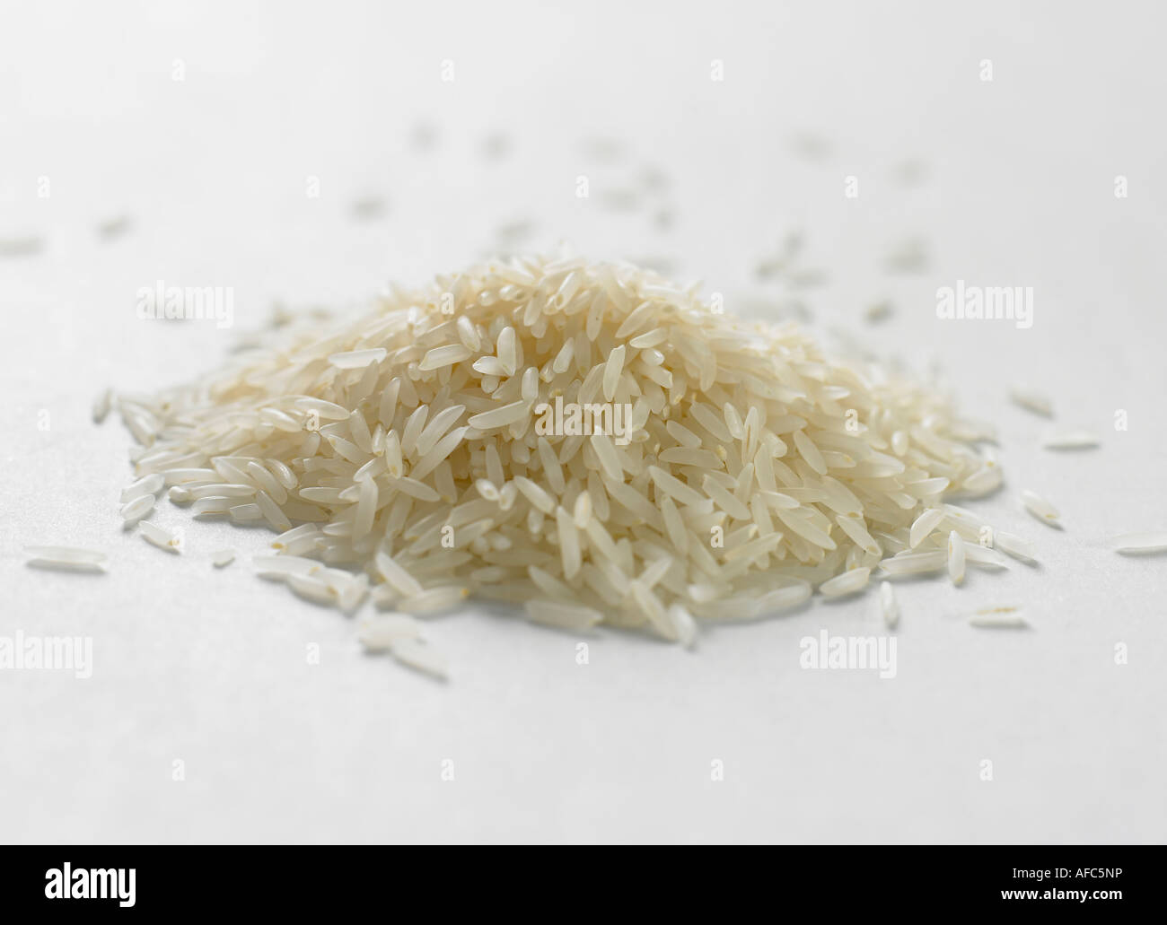 small pile of white organic basmati rice Stock Photo - Alamy