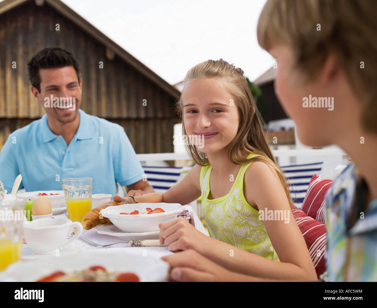 Family at breakfast table Stock Photo - Alamy