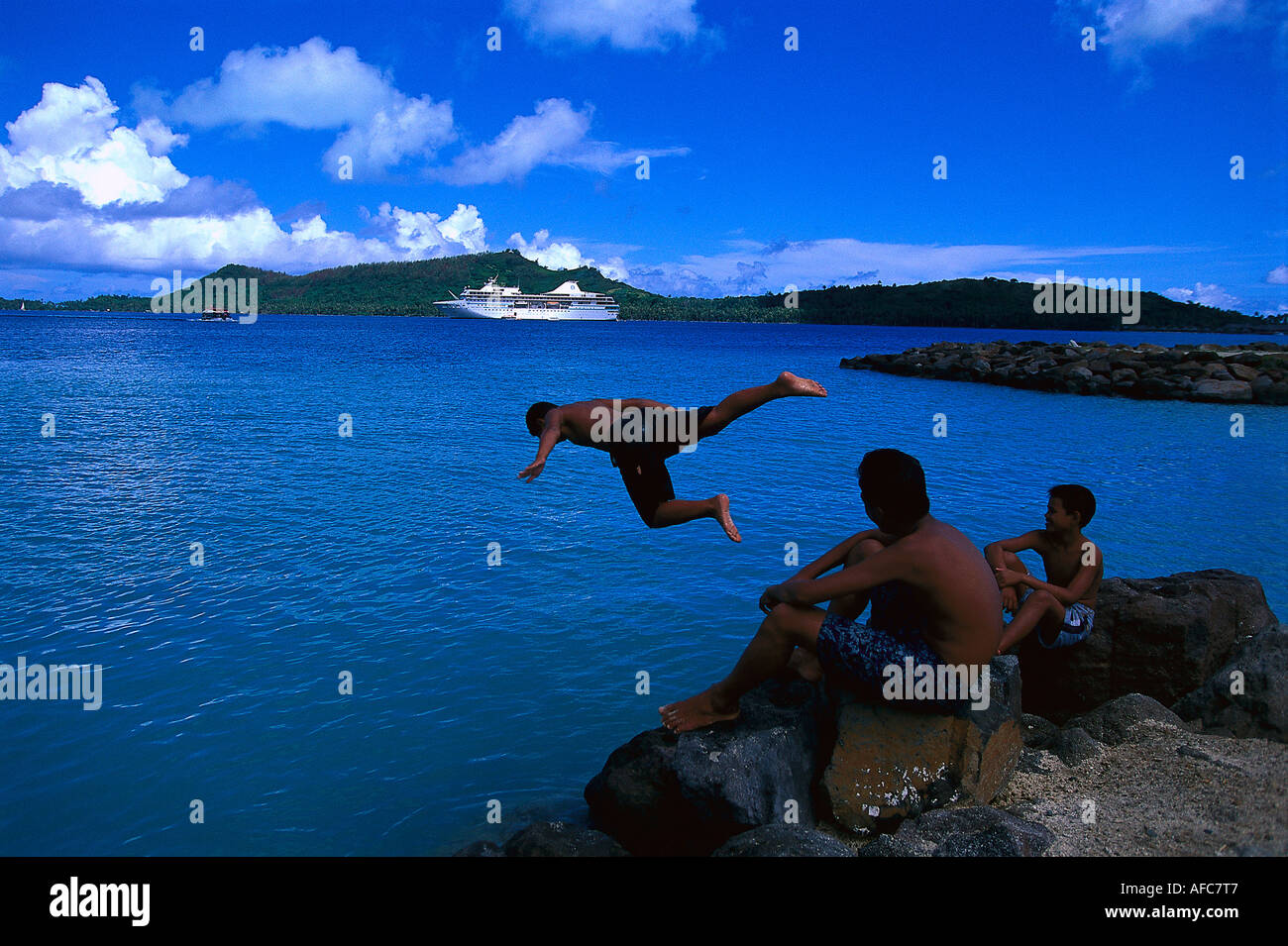 Kids & Cruiser Paul Gauguin, Bora Bora French Polynesia Stock Photo - Alamy