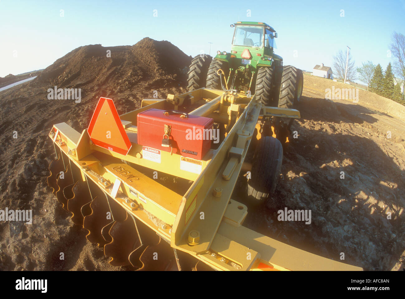 John Deere tractor and disc implement Stock Photo - Alamy