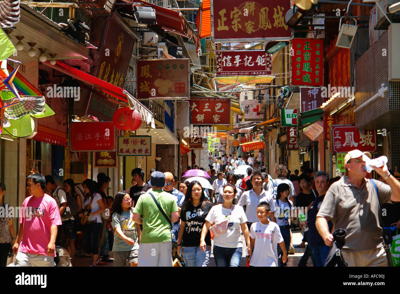 Narrow shopping street in Macau China Stock Photo - Alamy