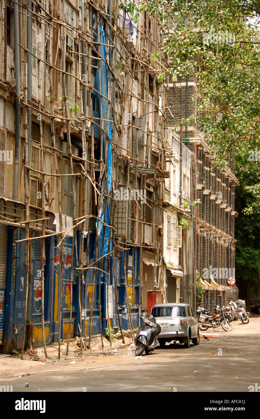 Side road with scaffolding and building work in Mumbai, India Stock ...