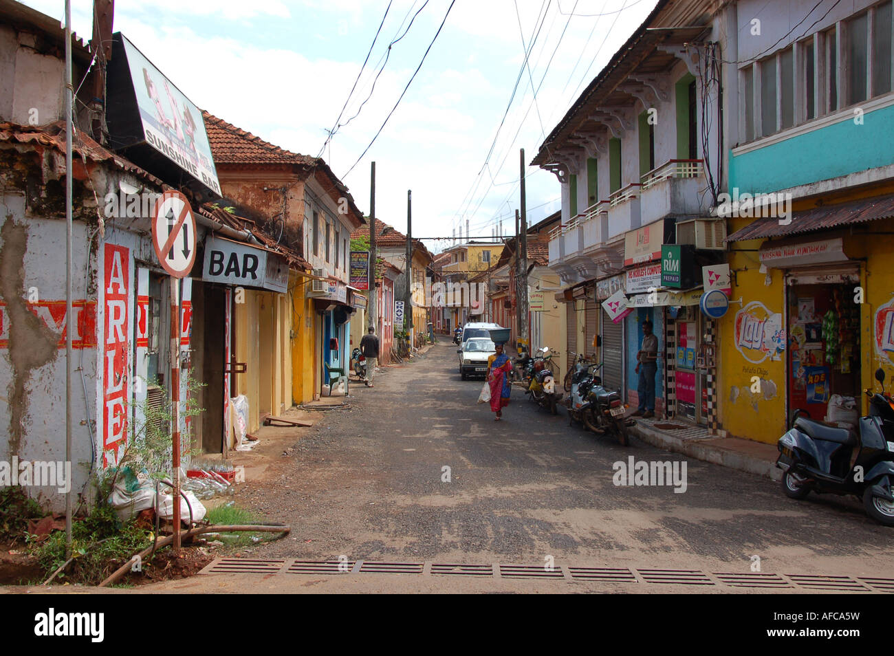Colourful painted buildings on street in Fontainhas latin quarter of ...