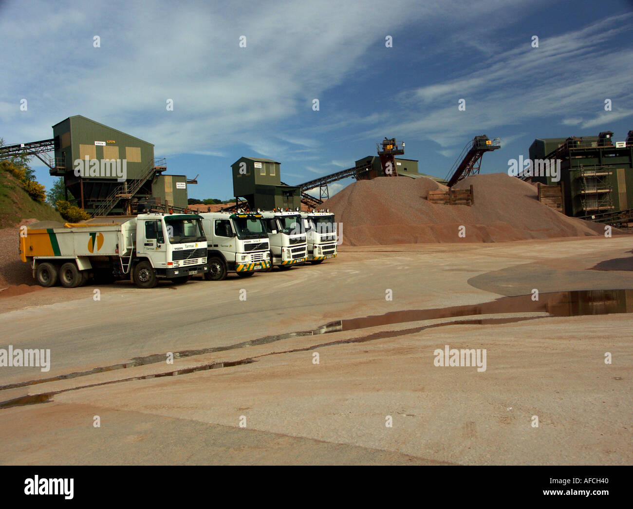 Quarry at Hints with lorries parked Stock Photo - Alamy
