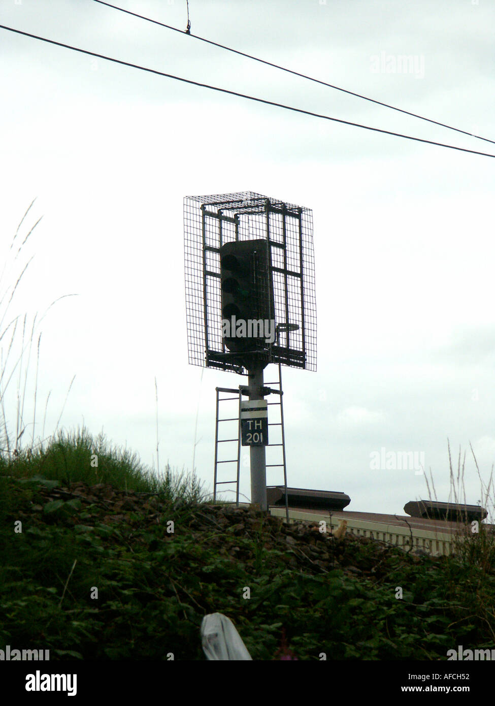 Signals on Railway Line and overhead cables Stock Photo - Alamy
