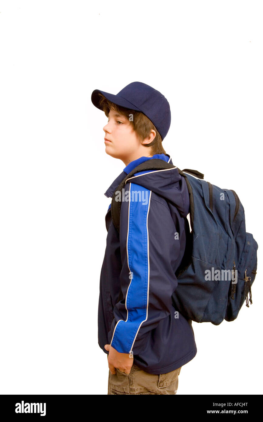 Child ready for school wearing heavy backpack Stock Photo - Alamy