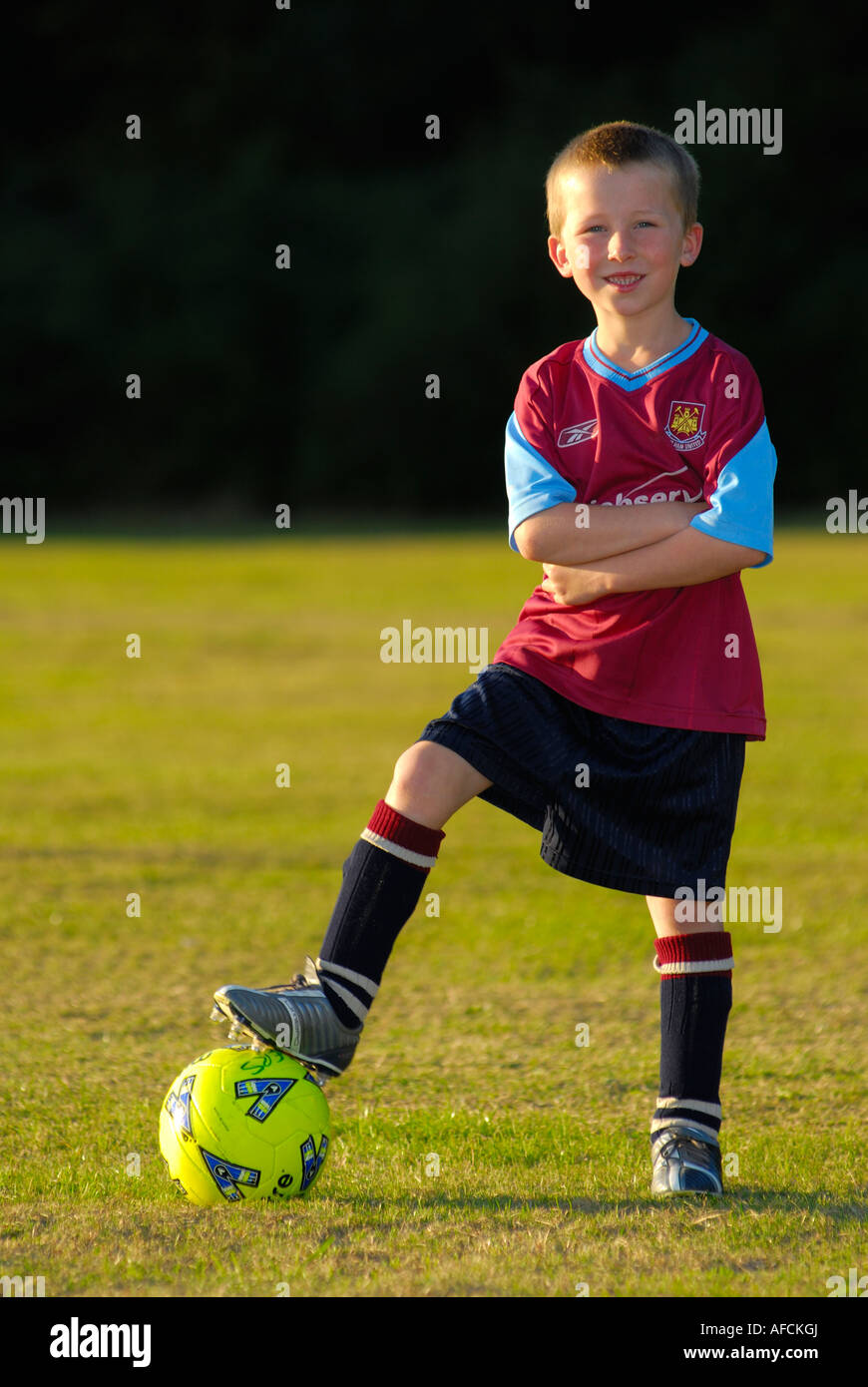 Boy wearing football kit hi-res stock photography and images - Alamy