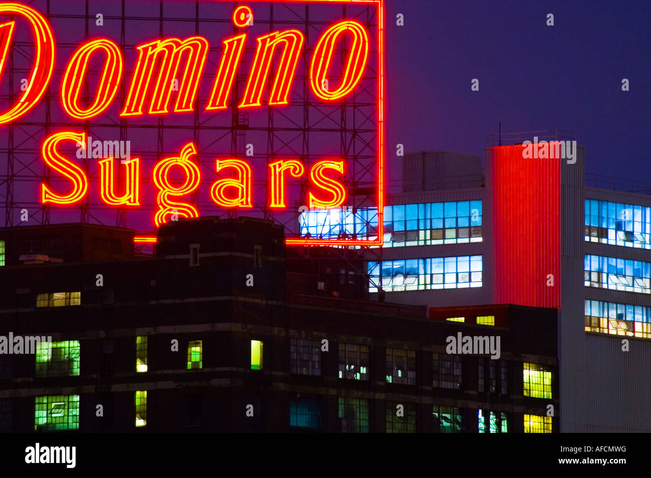 Domino Sugars Factory building and neon sign at night in Baltimore ...