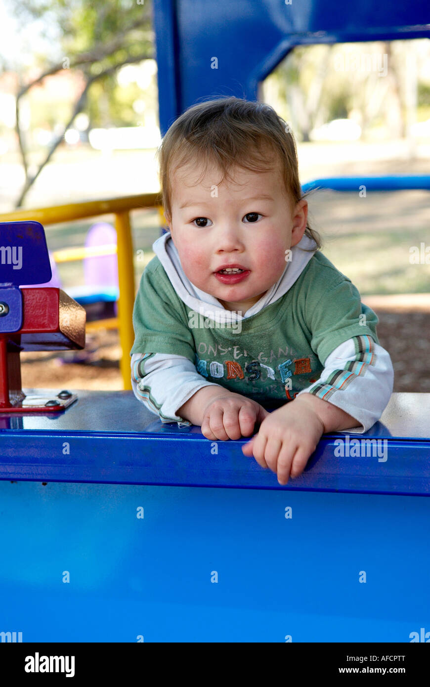 Twenty month old toddler boy playing in park Stock Photo - Alamy