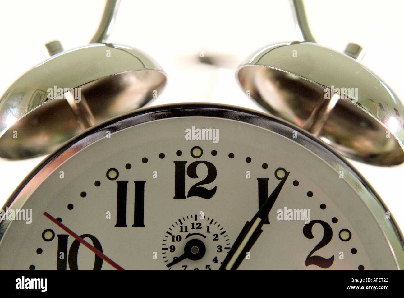 bell alarm clock with the hammer for the alarm bells moving and hitting ...